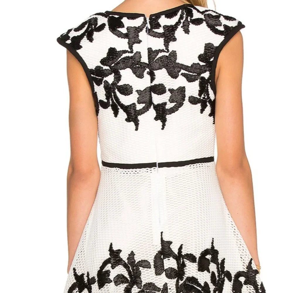 REVOLVE | Dresses | Revolve Riviera Chic Rope Mesh Fit Flare Dress ...